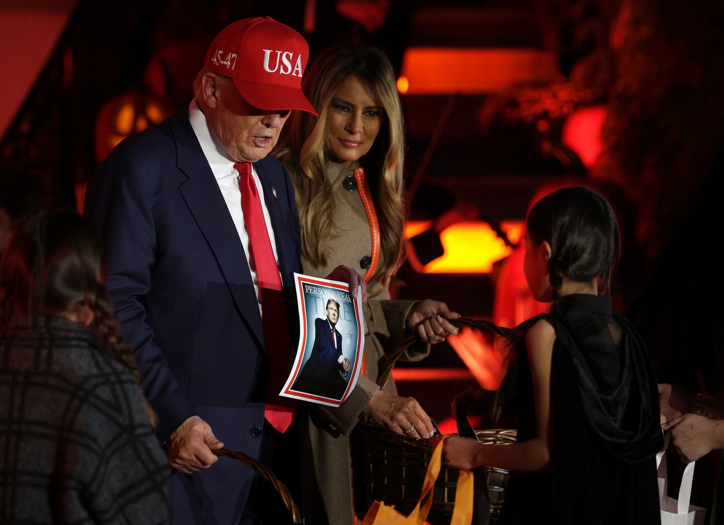 Donald Trump, 79, Brandishes Terrifying Photo at Trick-or-Treaters