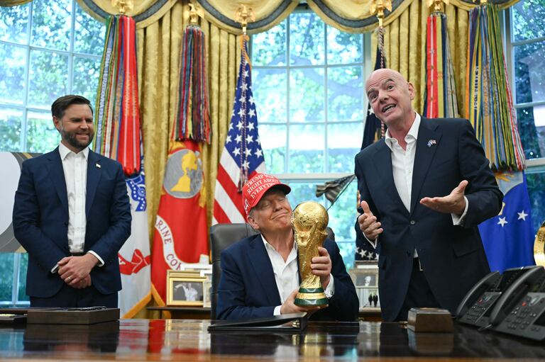 President Trump Tries to Grab Solid Gold World Cup for Blinged-Up Oval ...