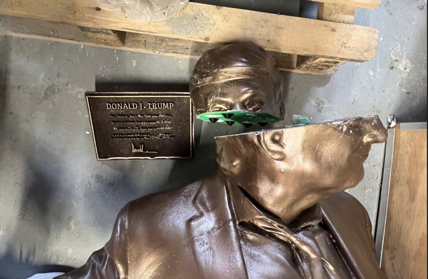 Photos Show How Trump Goons Smashed Up Epstein Statue