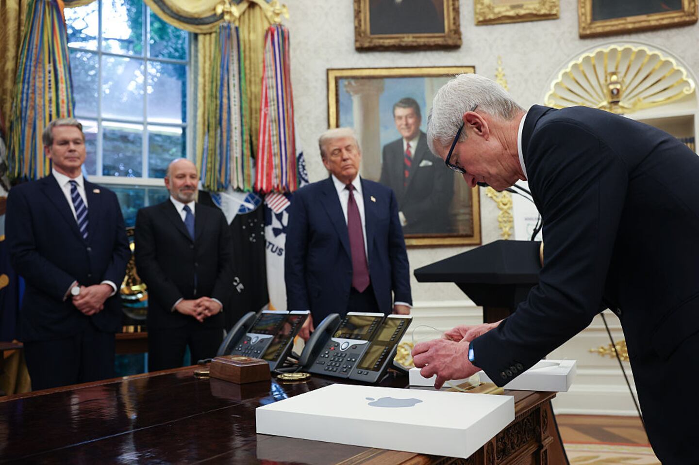 Billionaire Apple CEO Tim Cook Sucks Up to Trump With Tacky Gold Gift