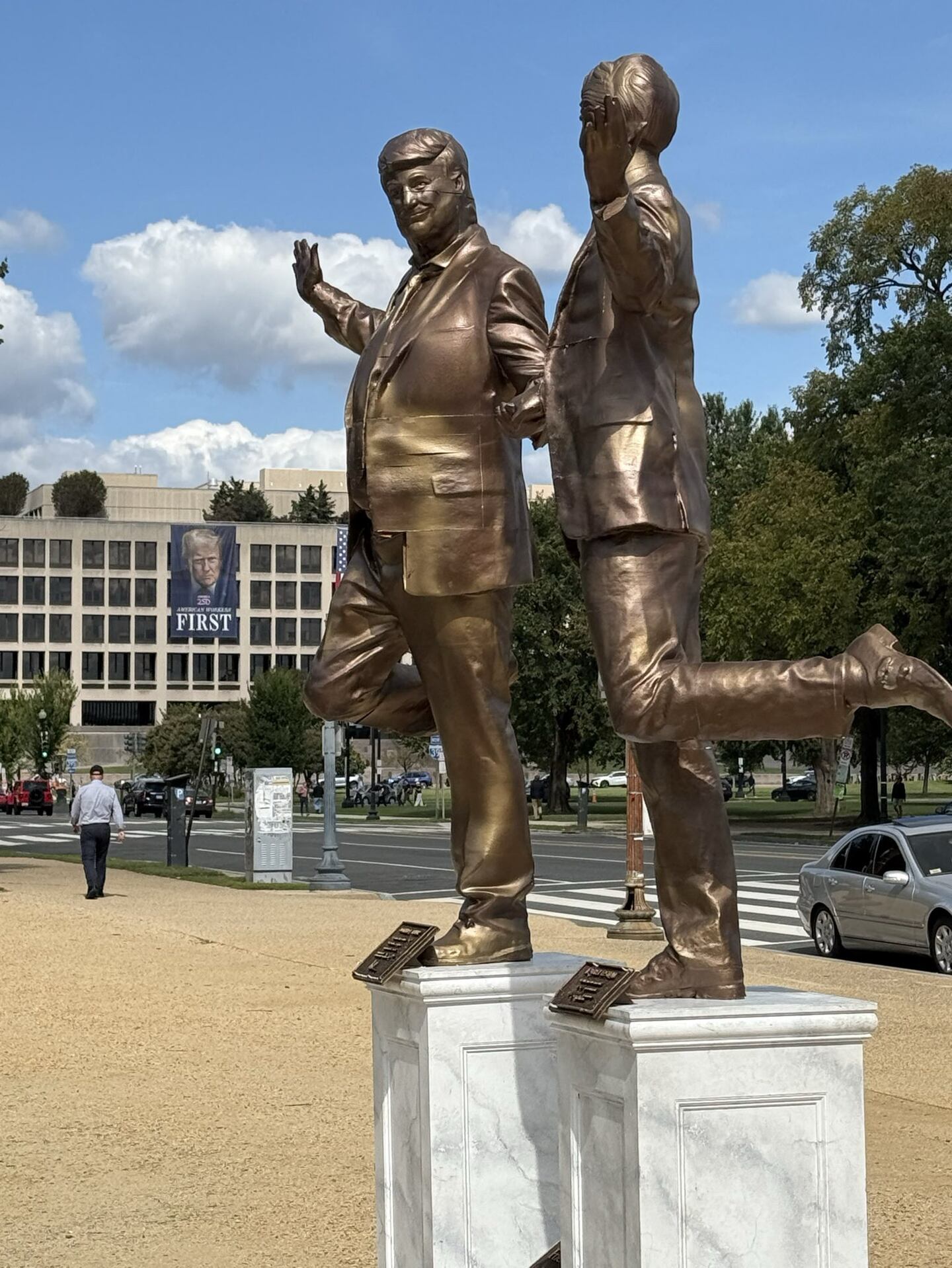 Photos Show How Trump Goons Smashed Up Epstein Statue