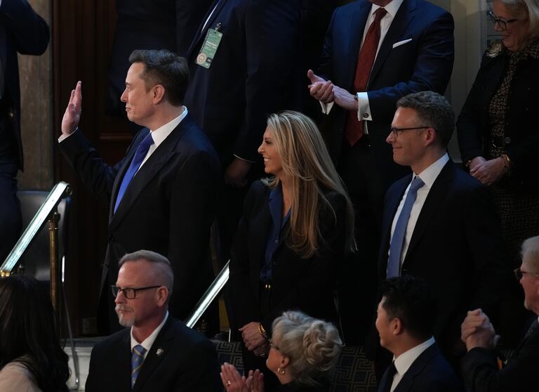 Mystery Blonde Woman Seated Next to Elon Musk at Trump’s Address Is ...