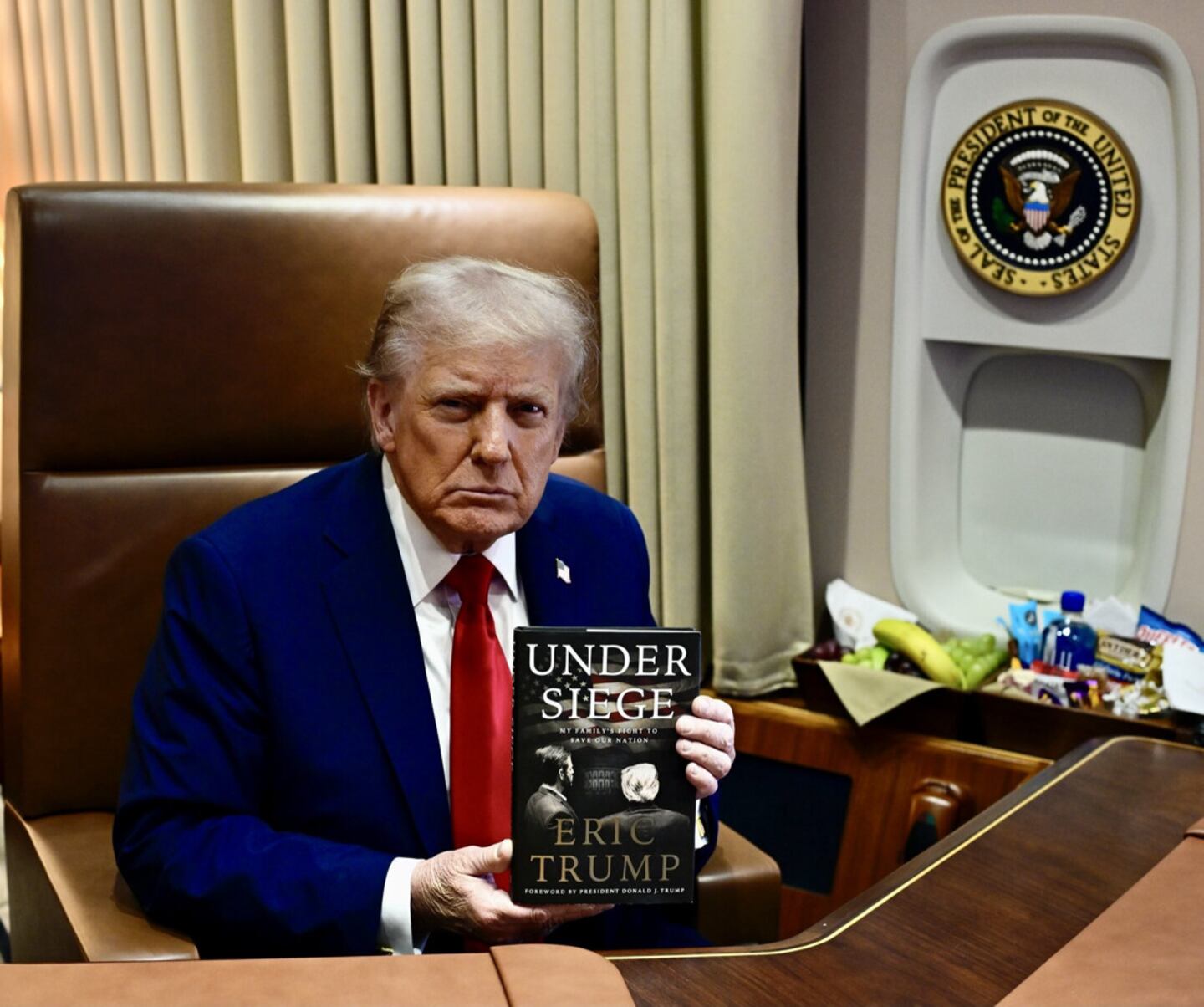 Donald Trump Plugs Son Eric Trump’s ‘Record-Breaking’ Memoir Above All the World’s Problems