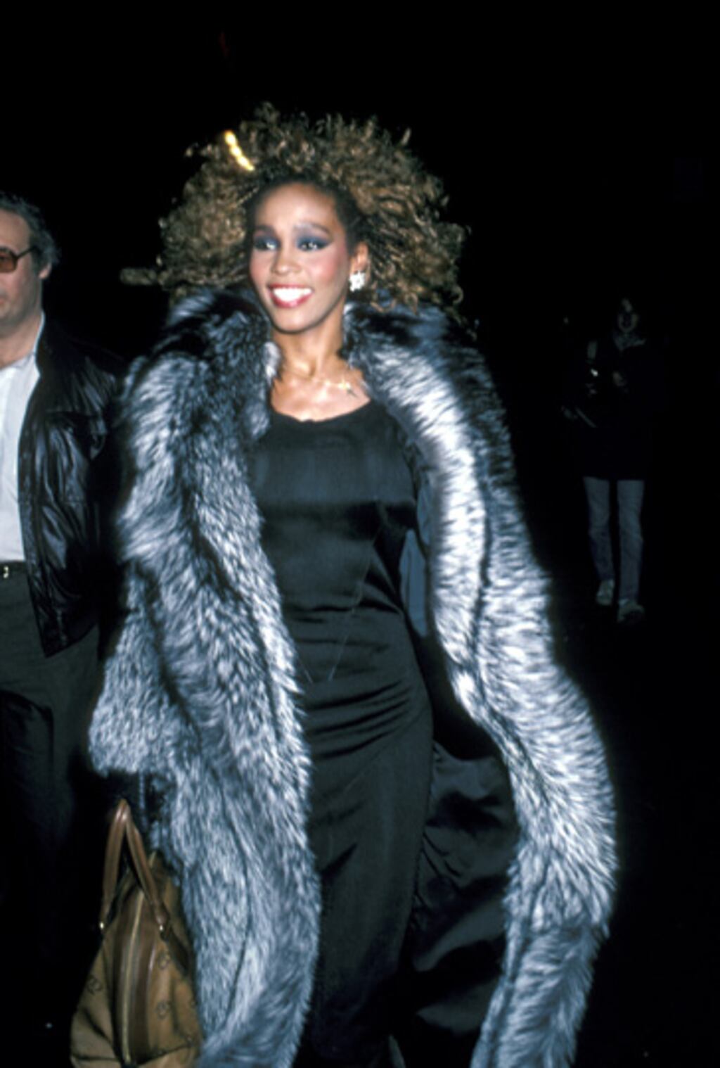 Whitney Houston’s Signature Style Looks Over the Years (PHOTOS)
