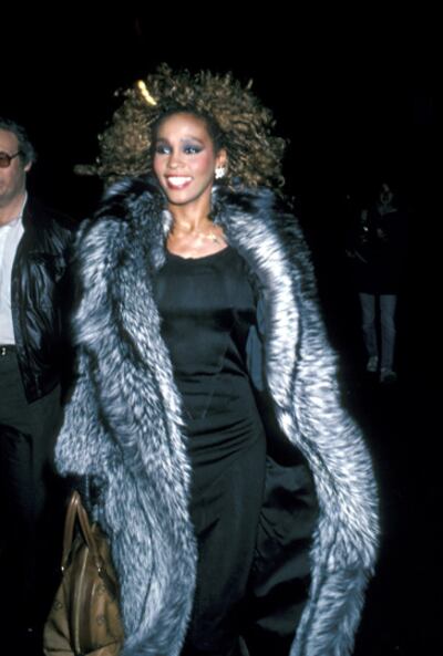 Whitney Houston’s Signature Style Looks Over the Years (PHOTOS)