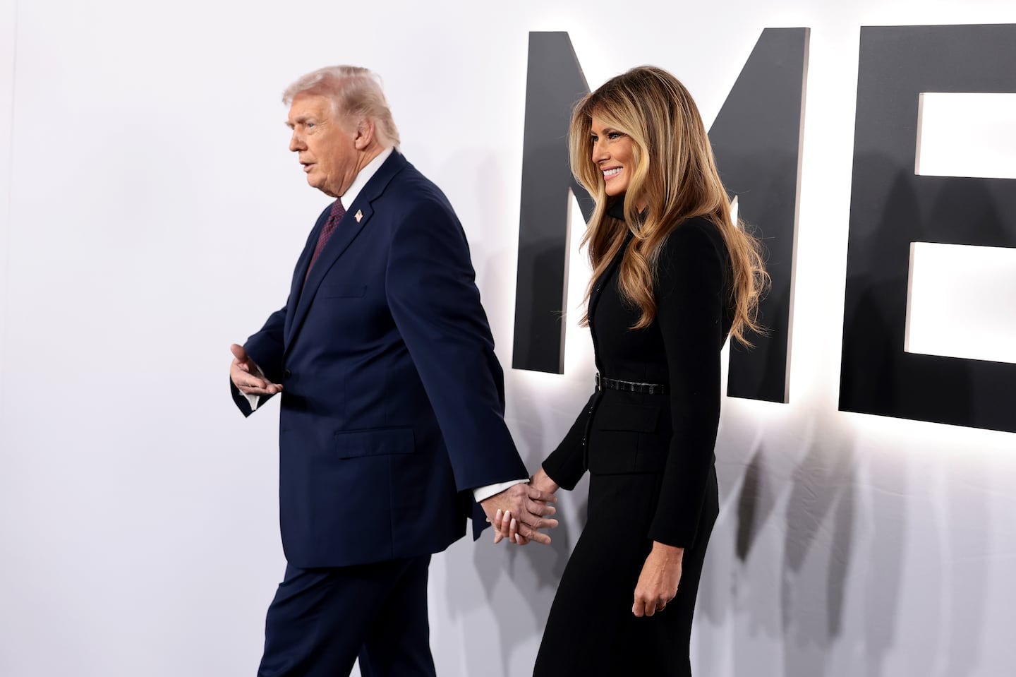 Trump, 79, Coats Hand in Makeup for Melania’s Documentary Premiere