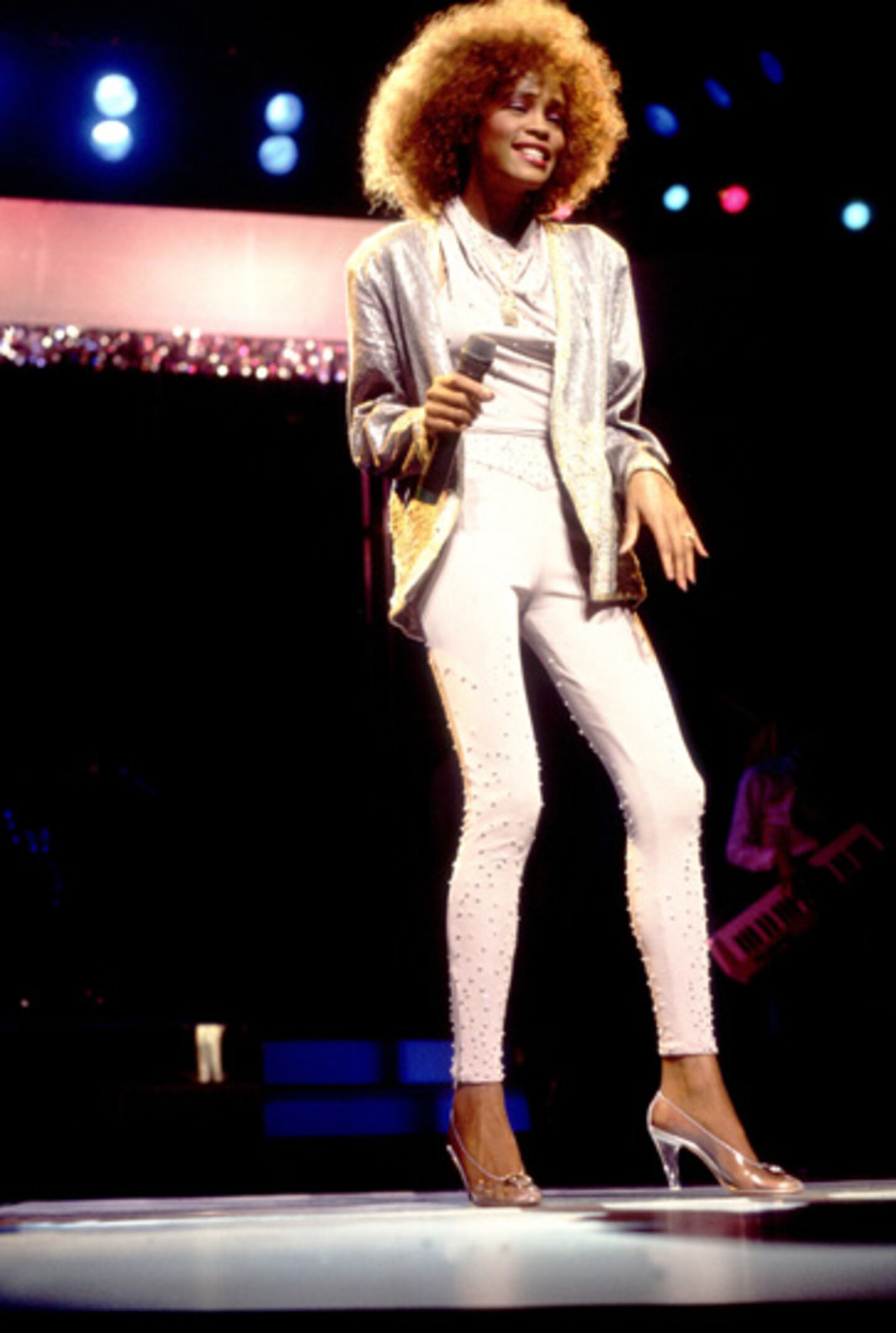 Whitney Houston’s Signature Style Looks Over the Years (PHOTOS)