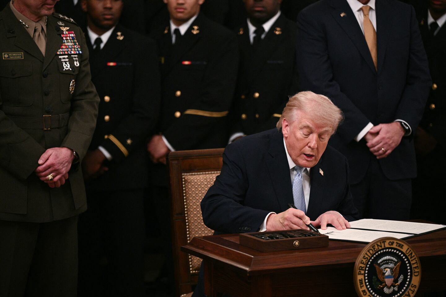 Donald Trump, 79, Struggles to Fit Swollen Cankles Under Weirdly Tiny Desk