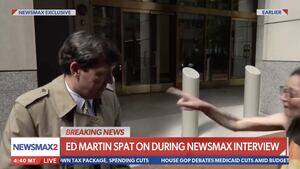 DOJ Charges Woman With Federal Assault for Spitting on Ed Martin