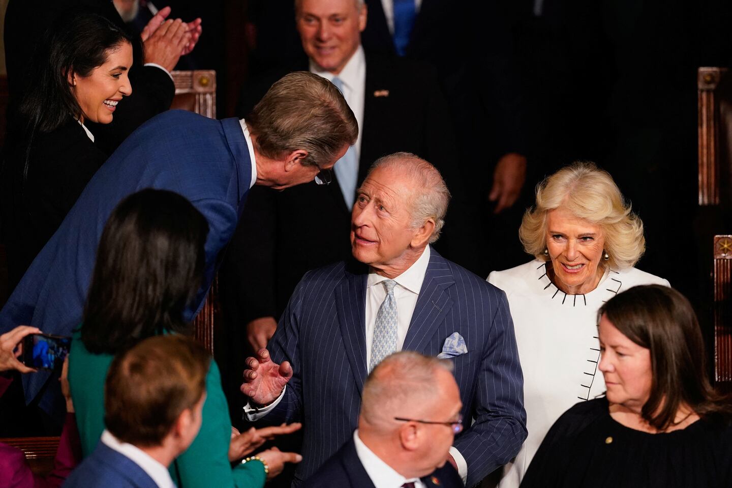 MAGA Diehards Rebel Against Trump to Cheer King Charles