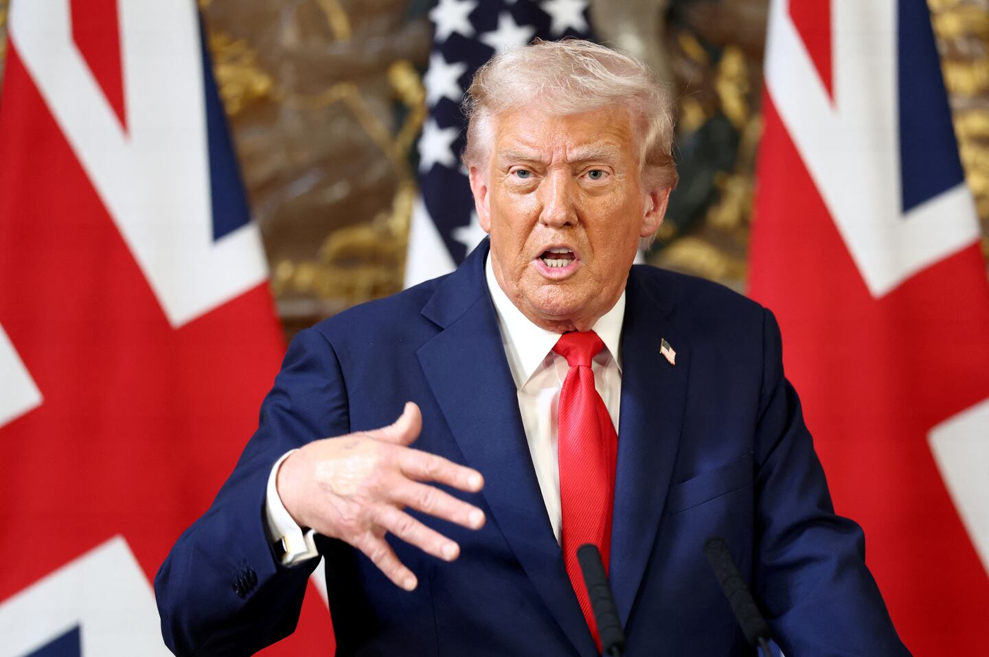 Trump, 79, Departs U.K. With Makeup-Caked Hand on Full Display