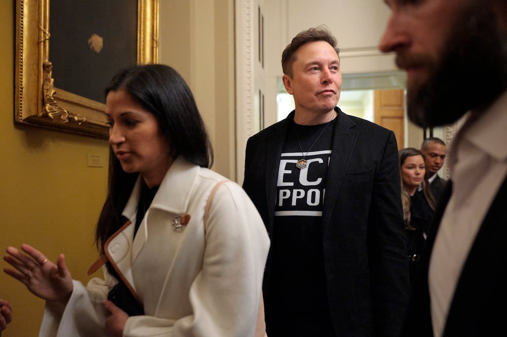 Stephen Miller’s Wife Puts on Show of Unity After Musk Drama